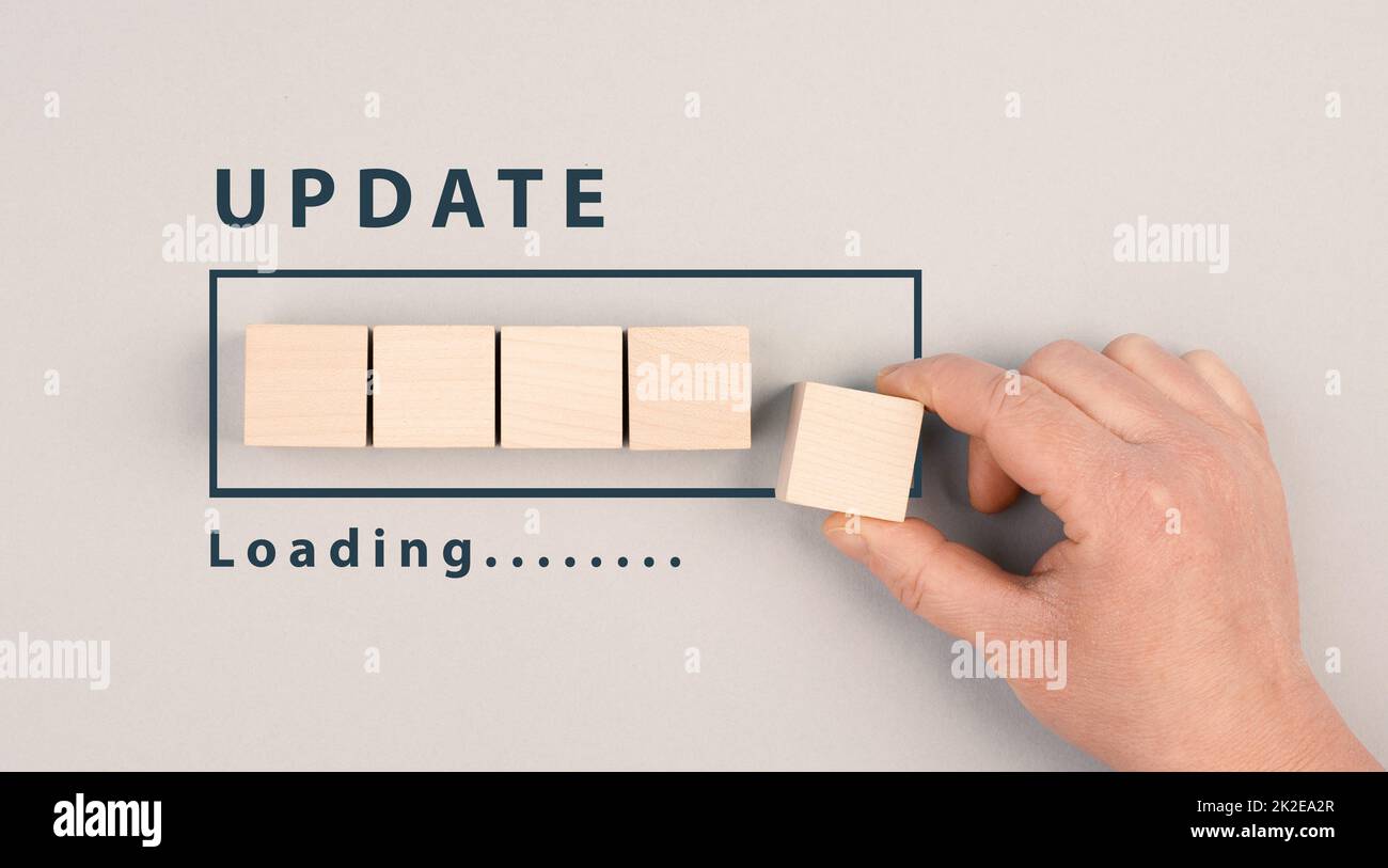 The words update loading are standing beside the progress bar, hand ...