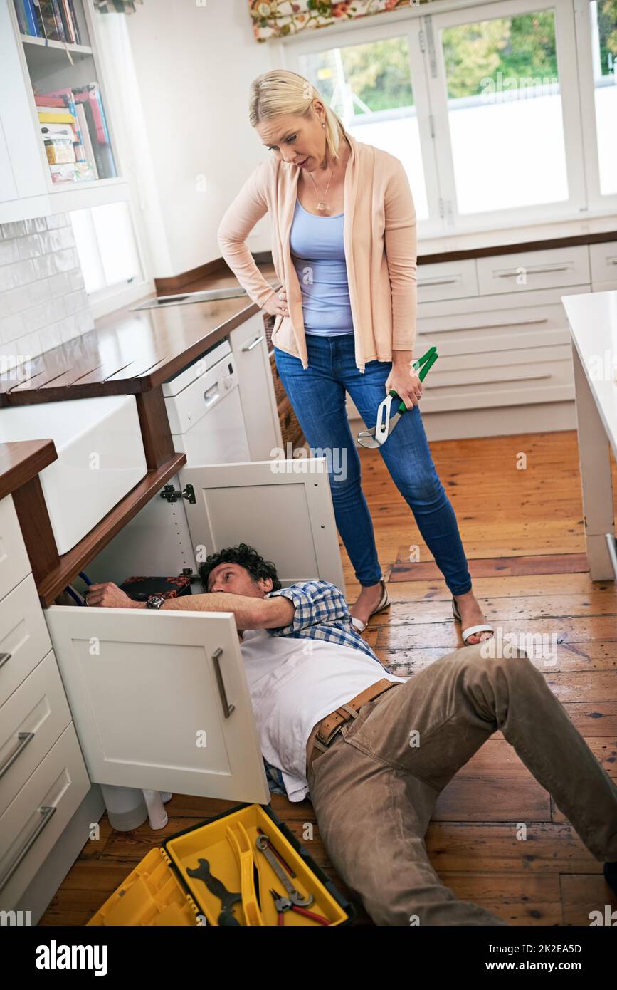 Honey I Think We Should Just Call A Professional Shot Of A Man Fixing