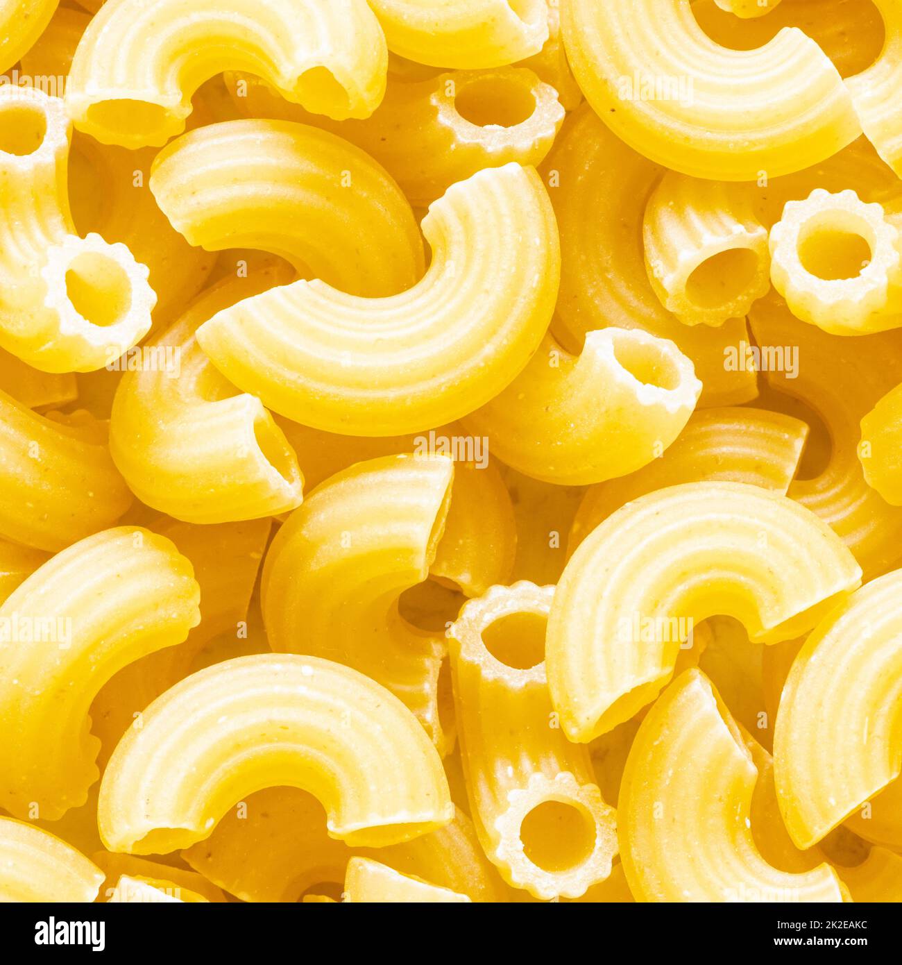 background from uncooked chifferini rigati pasta Stock Photo - Alamy