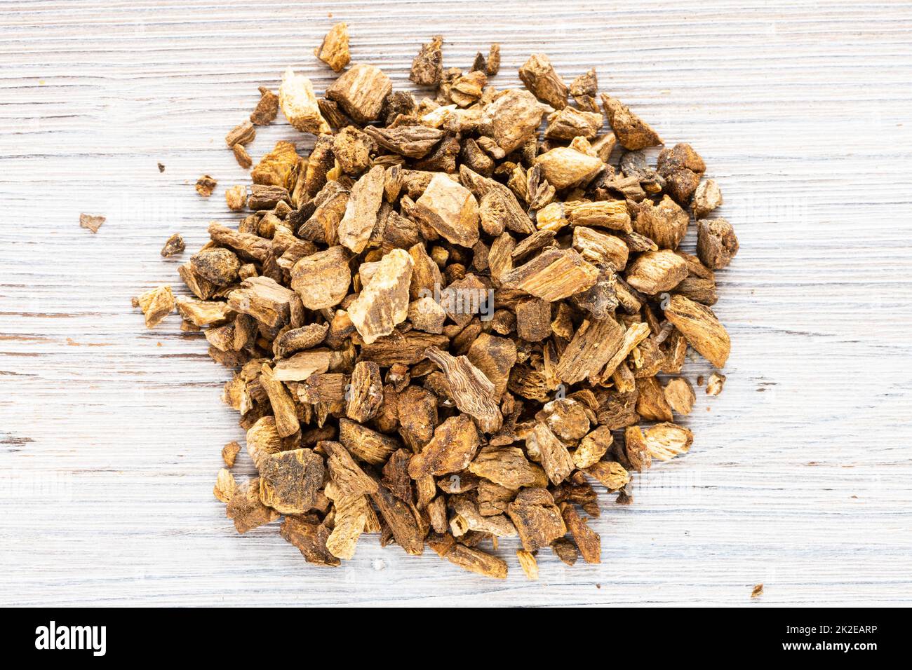 pile of dried burdock roots on gray wooden board Stock Photo - Alamy