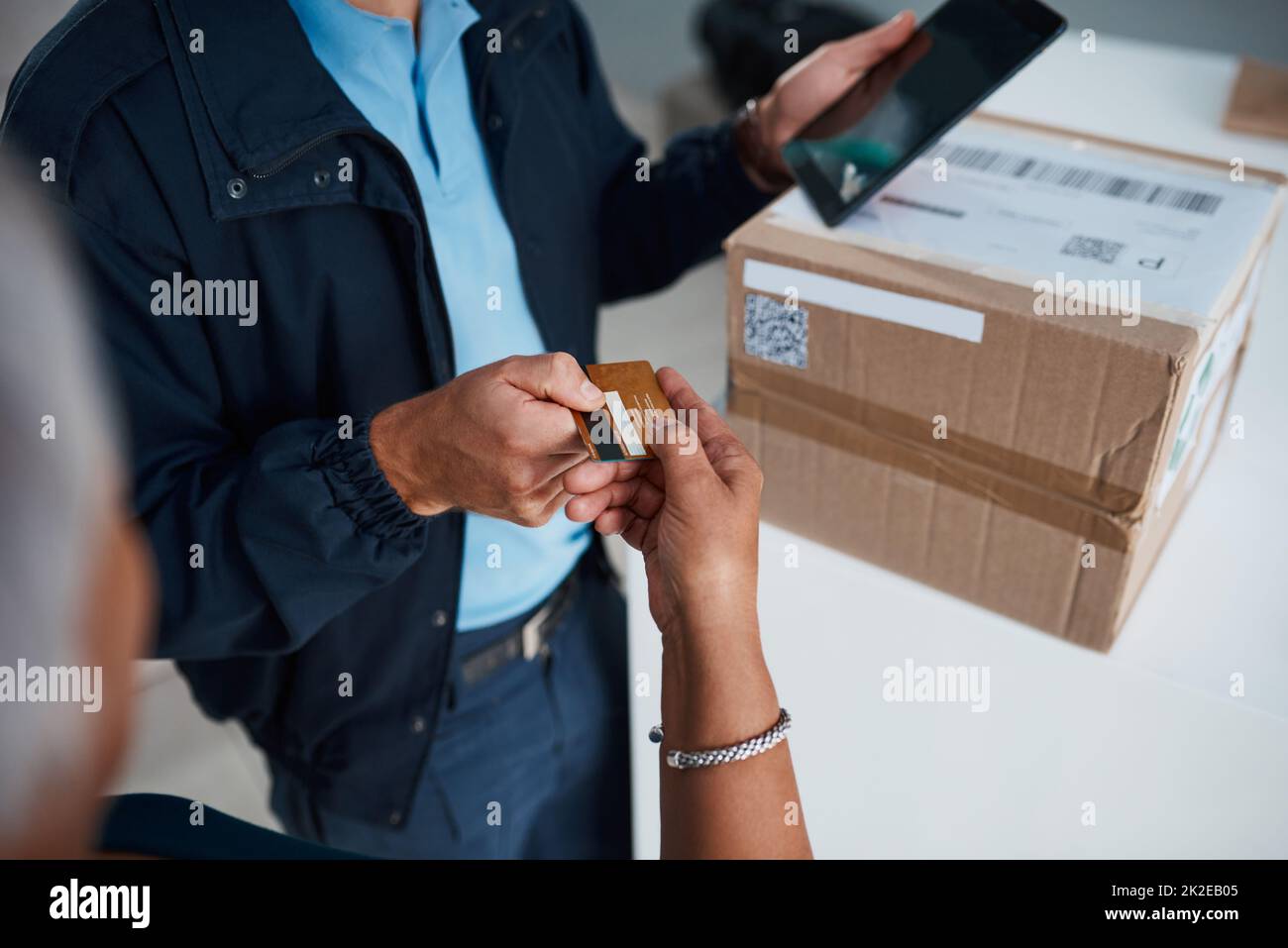 The best and safest way to pay these days. Cropped shot of an ...