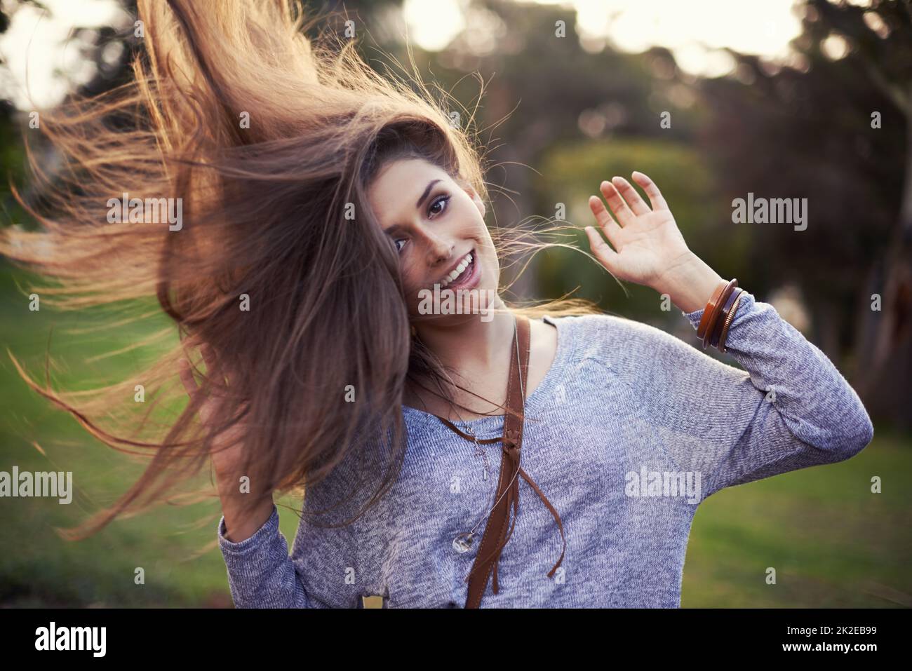 This Is What It Means To Be Alive Portrait Of A Beautiful Carefree Young Woman Flinging Her
