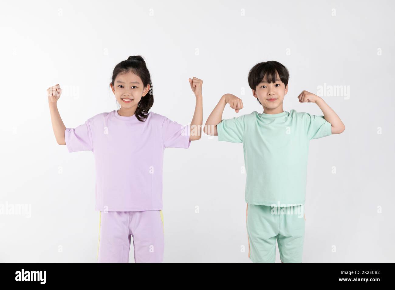 Korean boy and girl fitness and exercise concept in white background ...