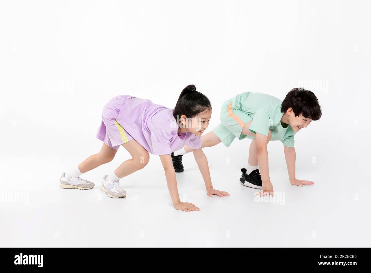 Korean boy and girl fitness and exercise concept in white background ...