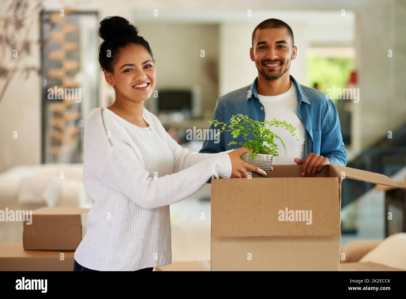 Well invite you to the housewarming. Portrait of a happy young couple ...