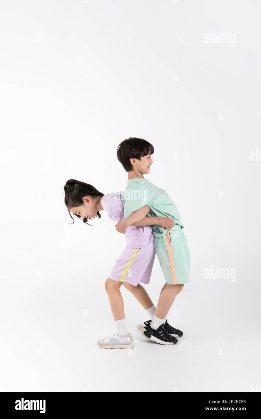Korean boy and girl fitness and exercise concept in white background ...