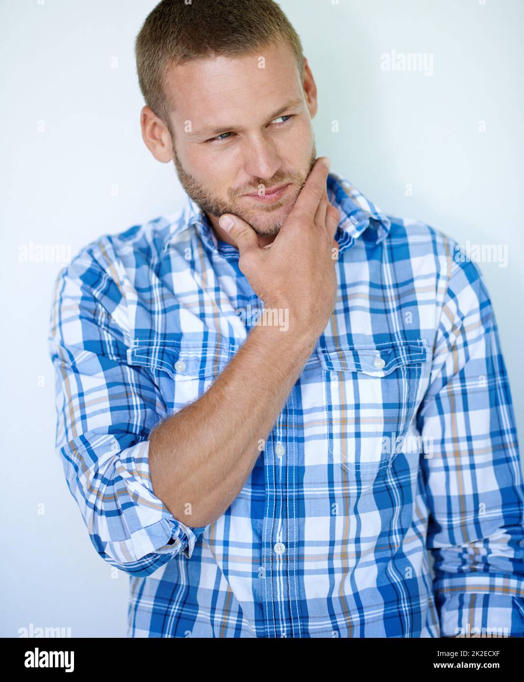 Check me out. Studio shot of a handsome young man posing against a ...