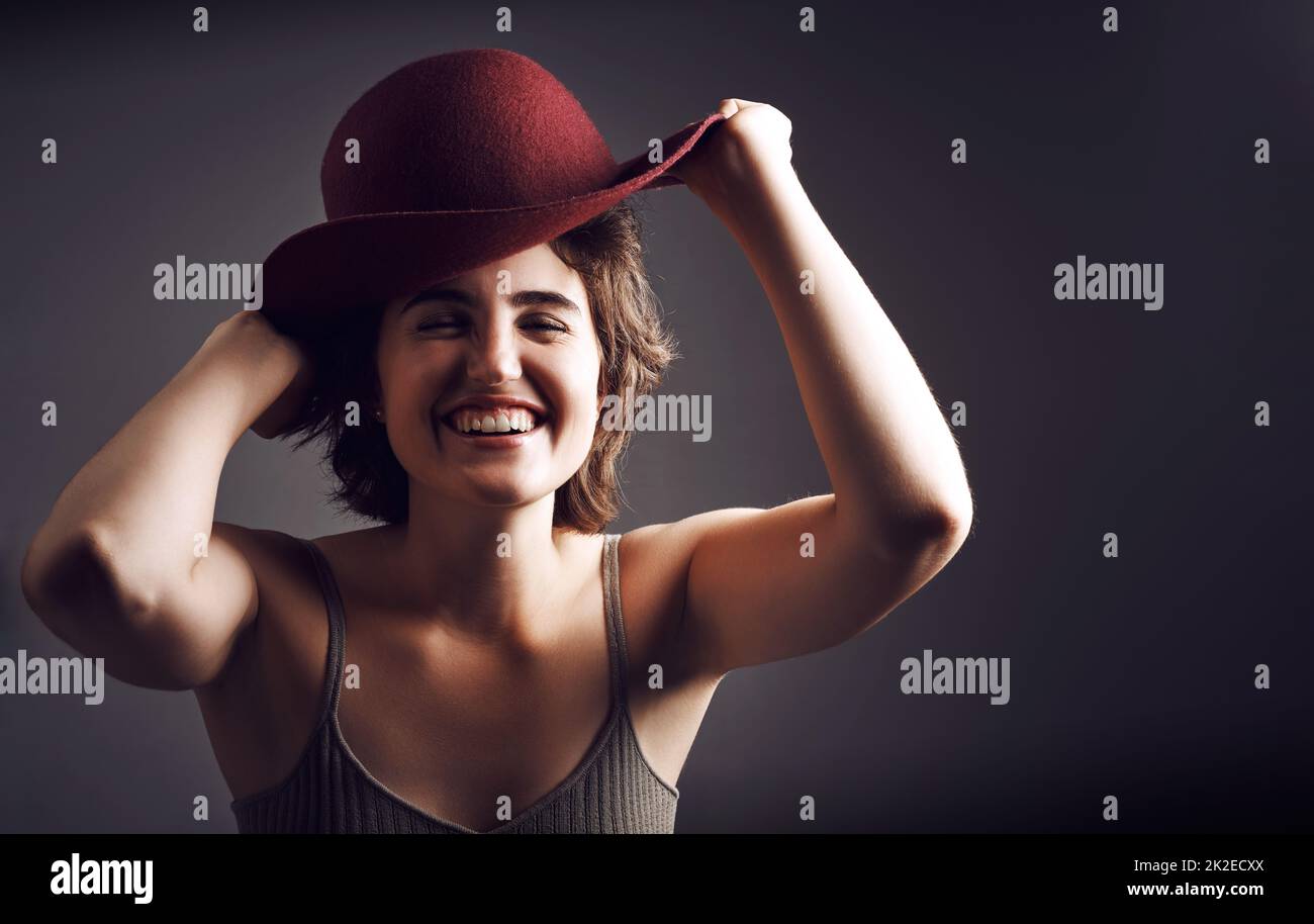 Adjusting hat hi-res stock photography and images - Alamy