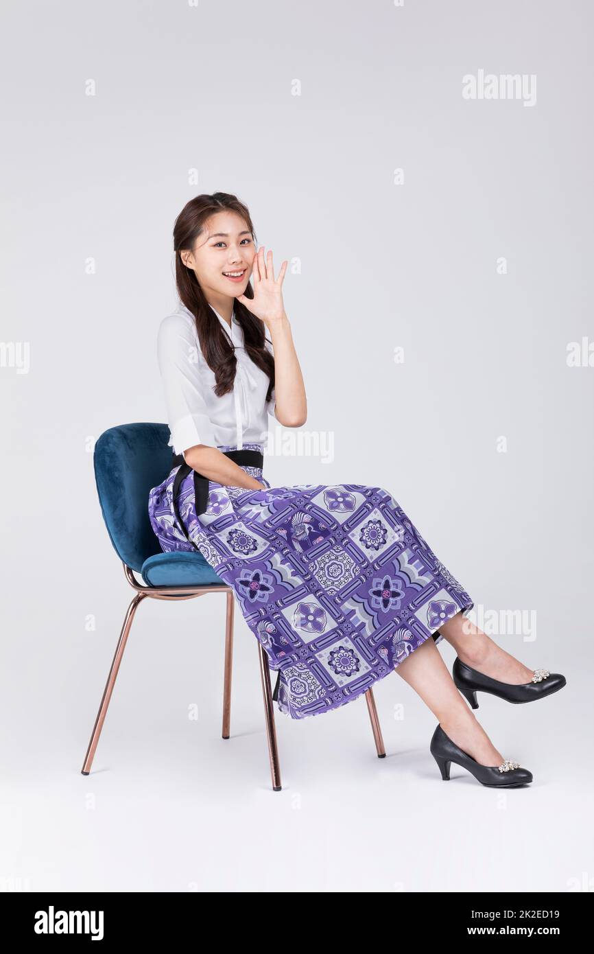 beautiful Korean woman in 20s wearing modern Hanbok talking motion ...
