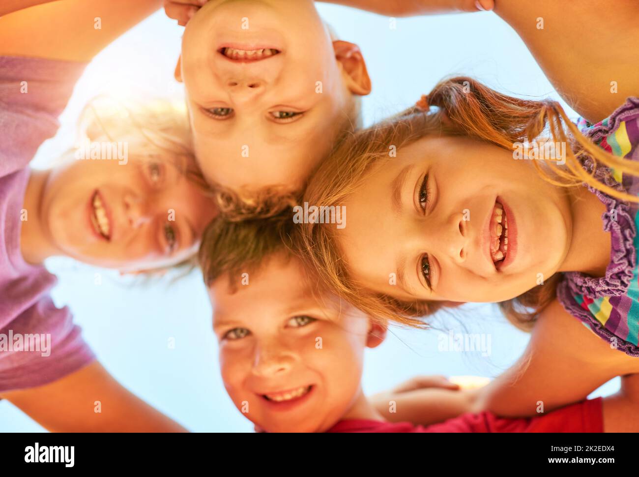 Children in huddle hi-res stock photography and images - Alamy