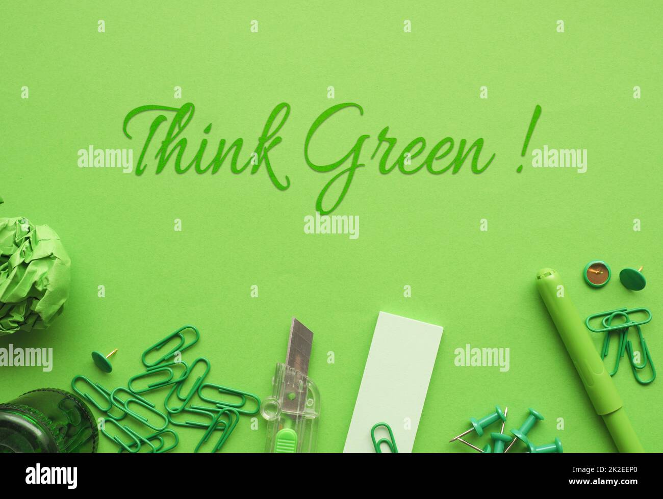 Text Think Green on a green paper background Stock Photo - Alamy