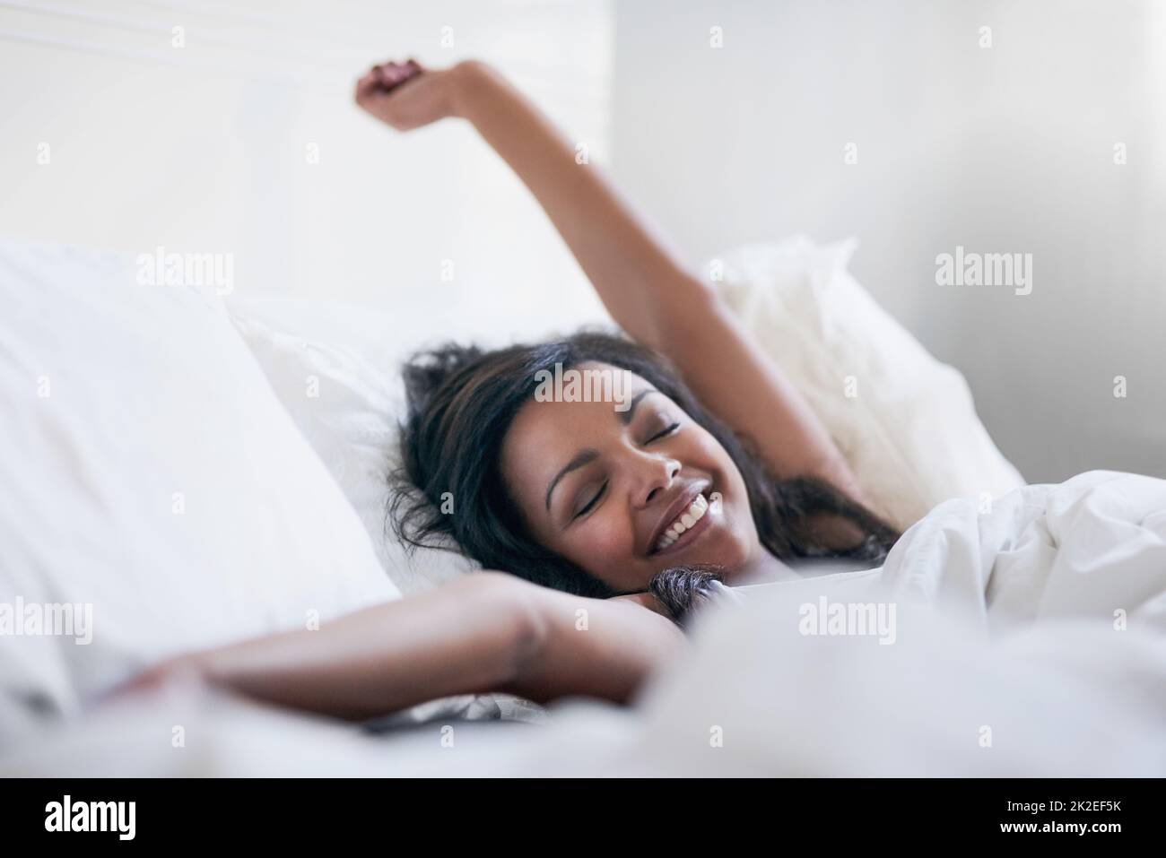 African american woman waking up in bed hi-res stock photography and ...