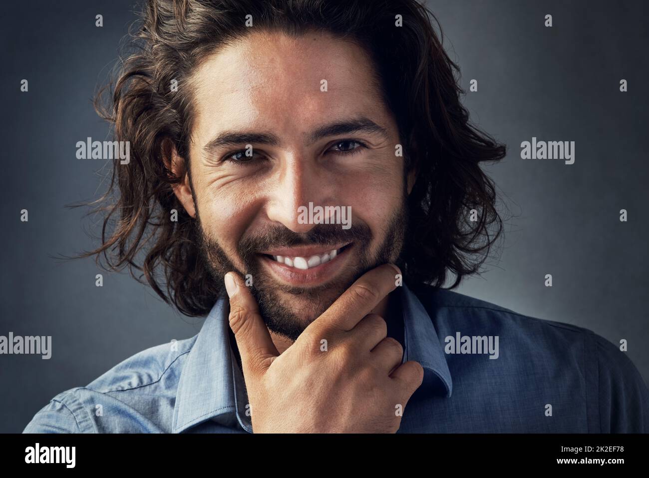 I make this look good. Studio portrait of a handsome young man posing ...
