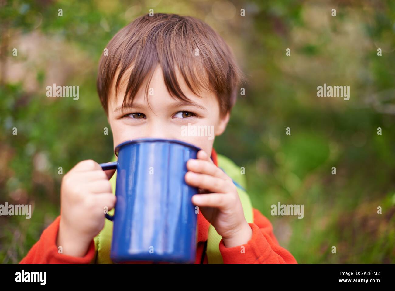 Little boy drinking from a cup hi res stock photography and images Alamy
