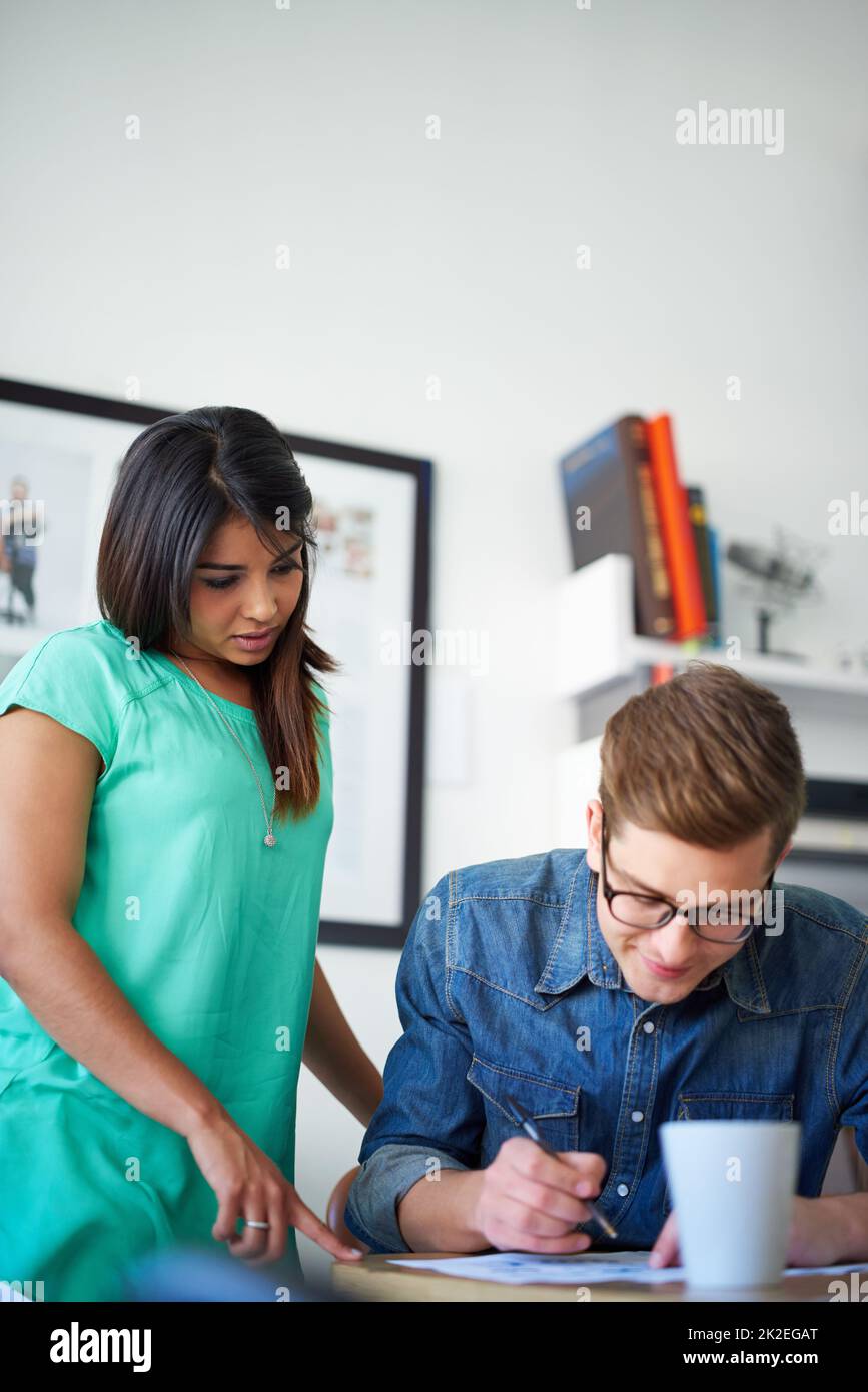 Making great progress on their project. two colleagues working together ...