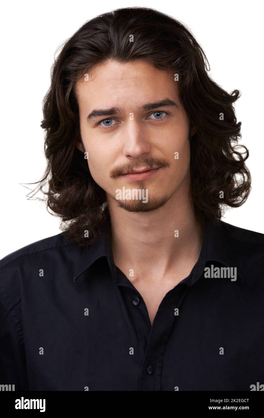 Giving you that dreamy smile. Handsome young man with shoulder-length ...