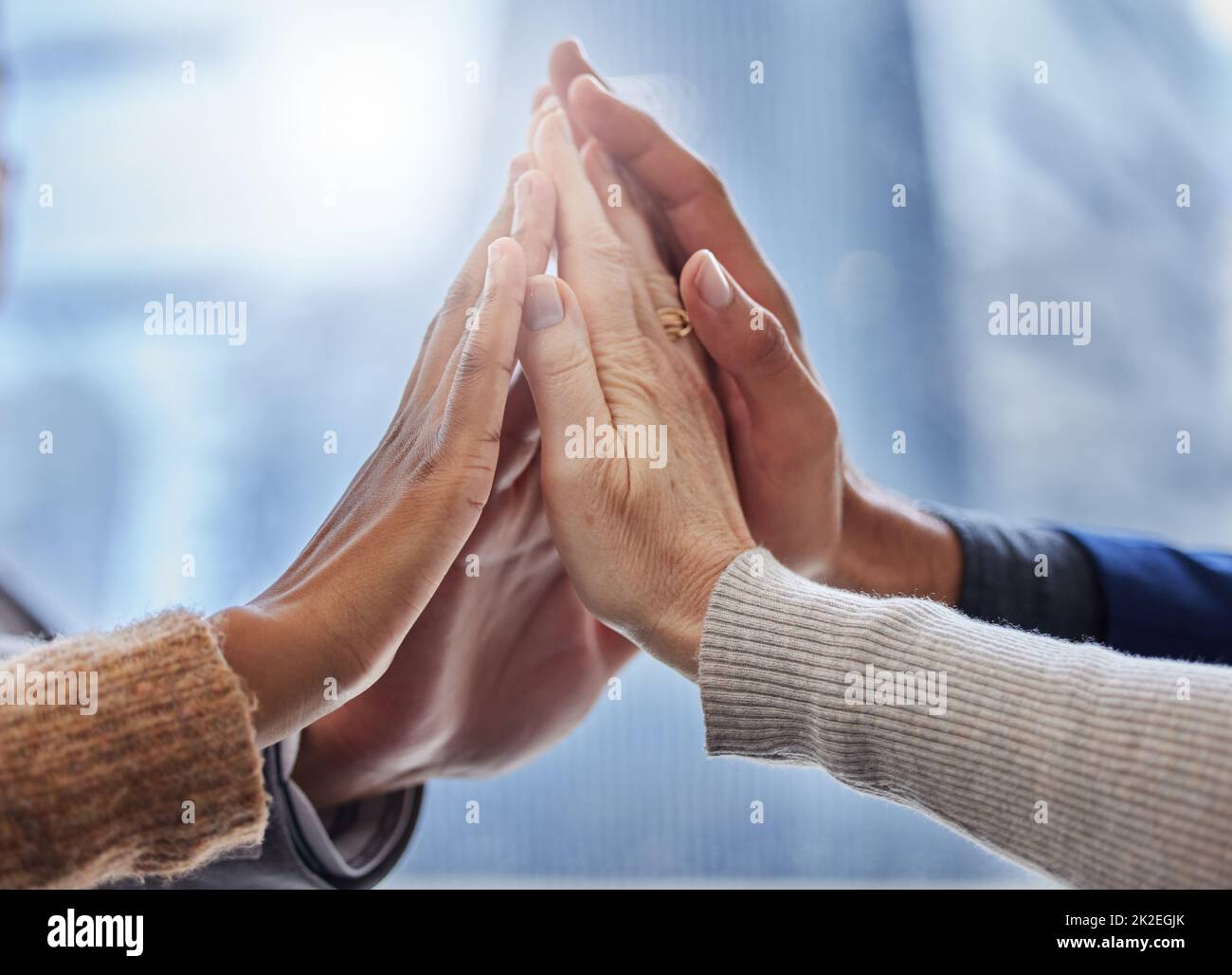 High fiving each other hi-res stock photography and images - Alamy