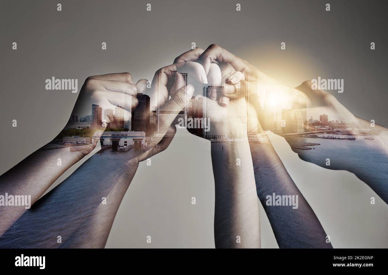 Our unity is our strength. Shot of a city superimposed over an ...