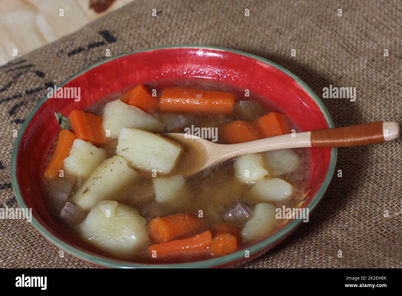 Hearty Beef Stew With Potato and and Carrots on Vintage Burlap potato ...