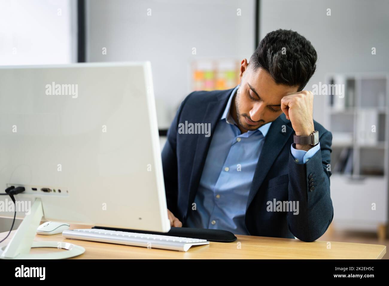 Bored Employee In Video Conference Training Stock Photo - Alamy