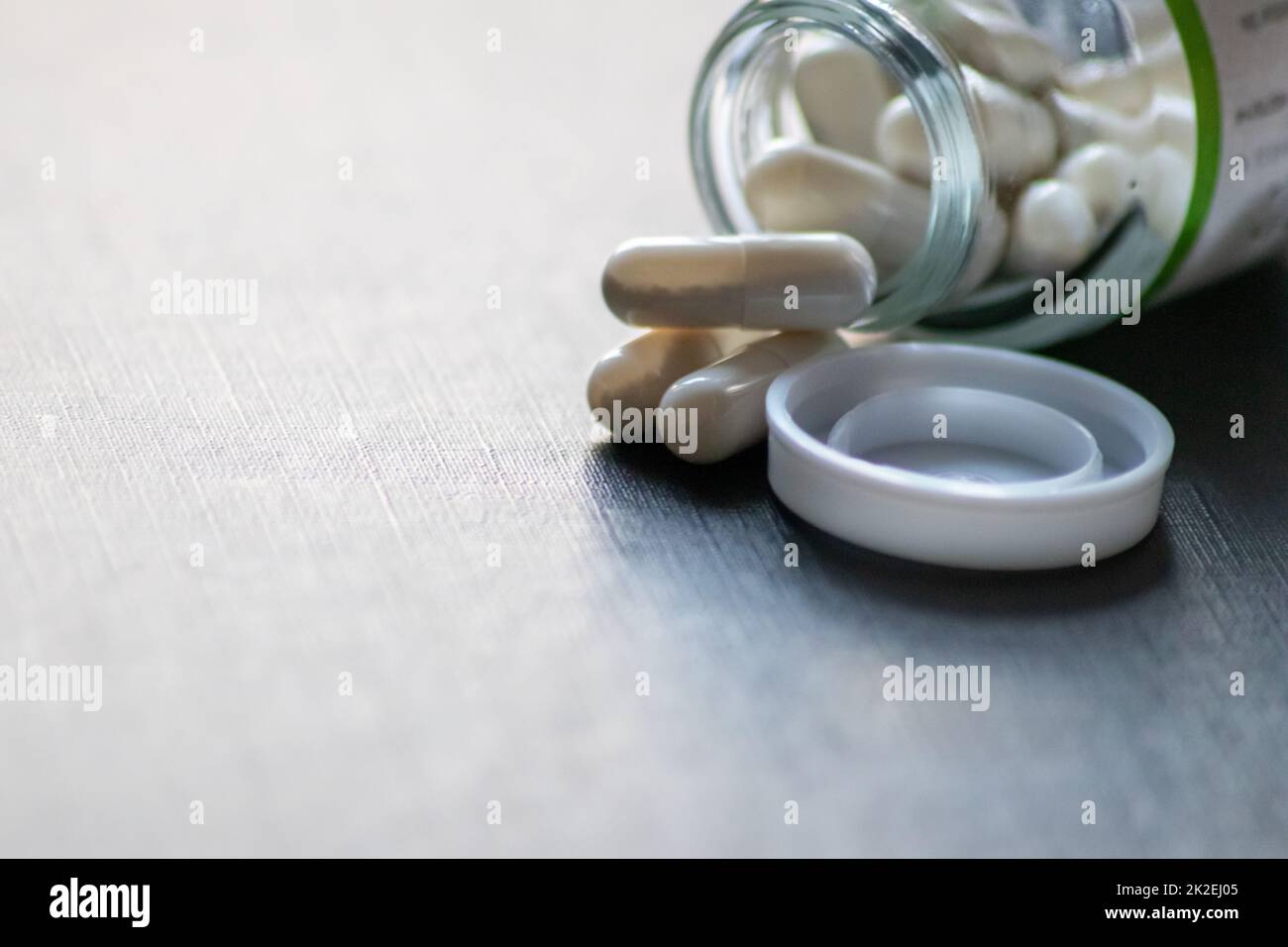 Many pills in medical jar for depression treatment show pandemic and ...