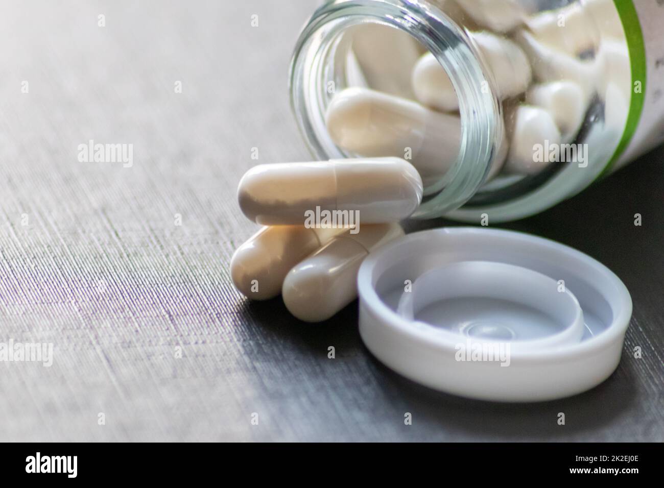 Many pills in medical jar for depression treatment show pandemic and ...