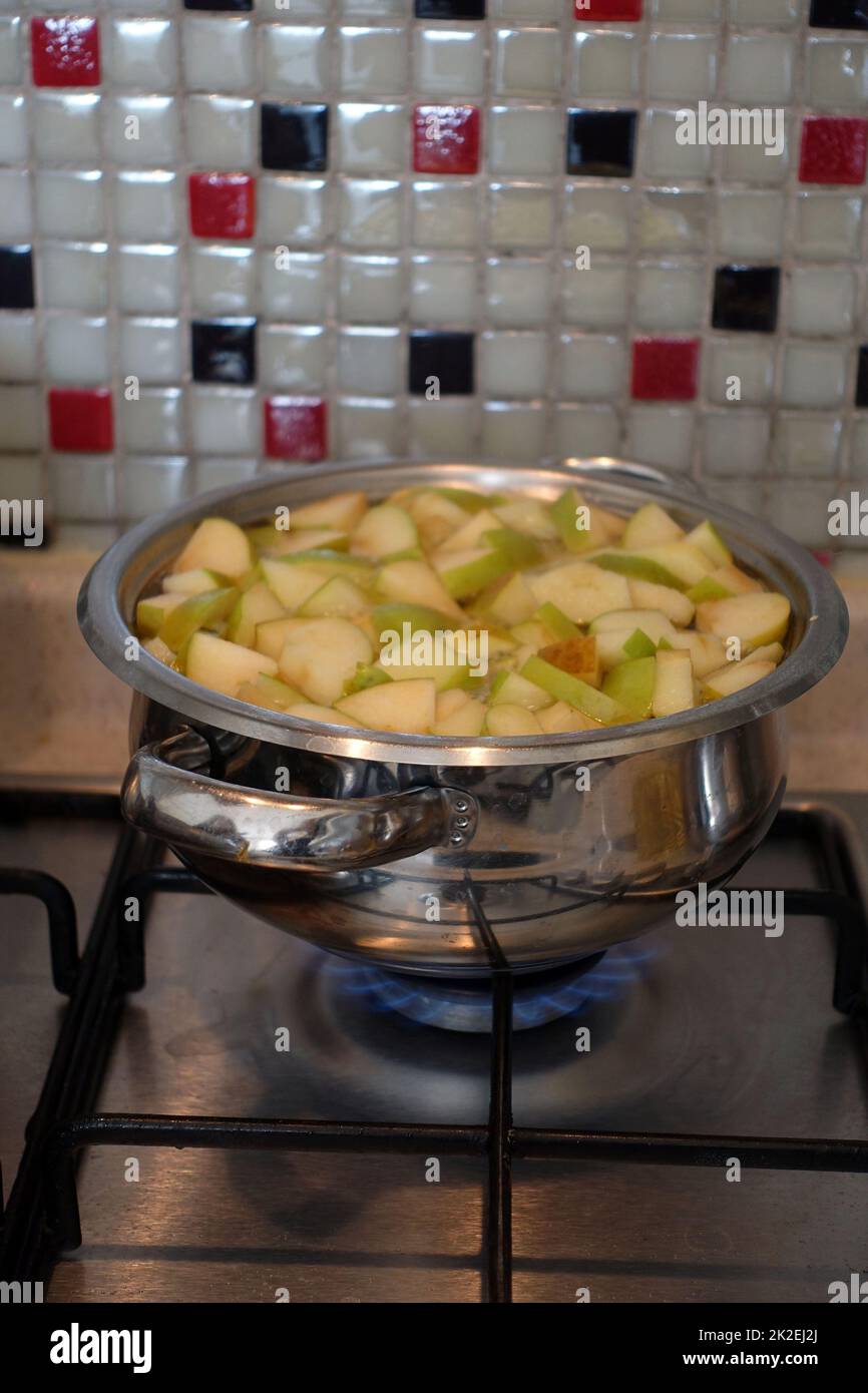 Freshly Chopped Apple Pieces Boiling in a Pot,Making Homemade Apple ...