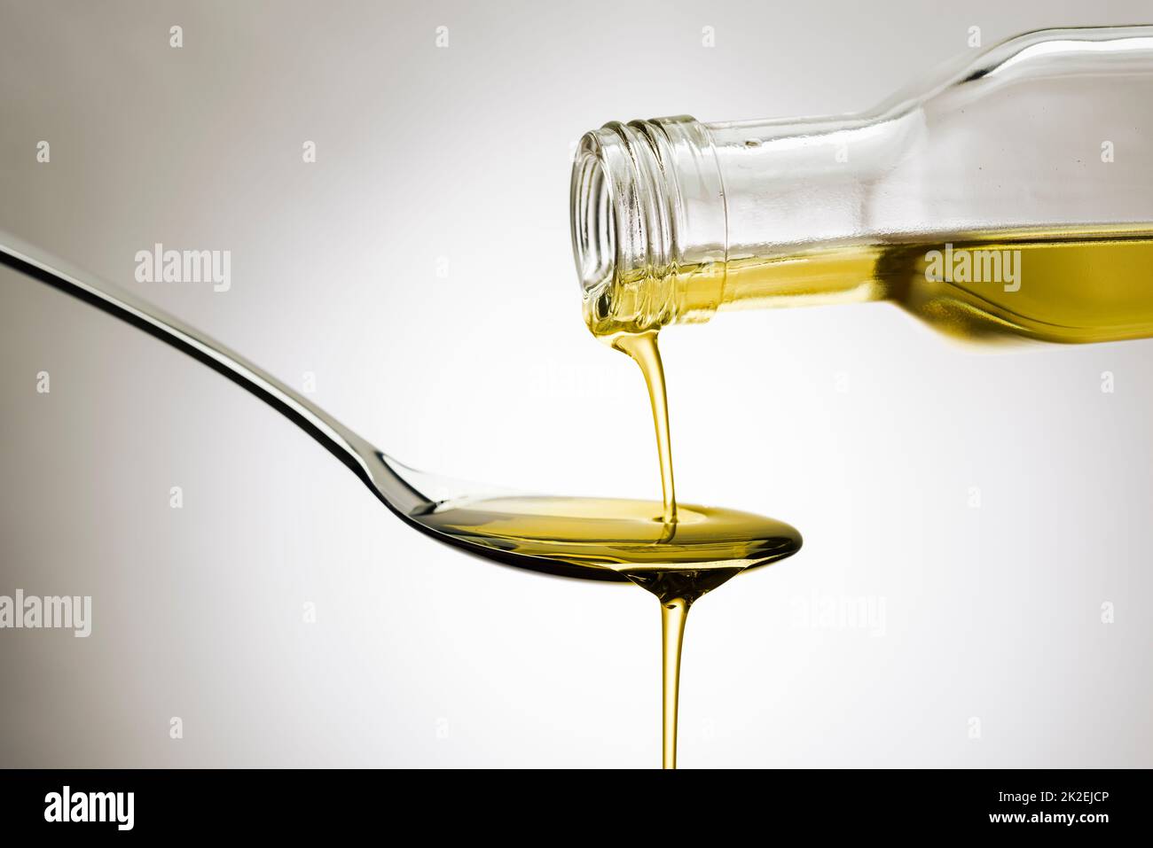 Yellow olive oil food pouring hi-res stock photography and images - Alamy