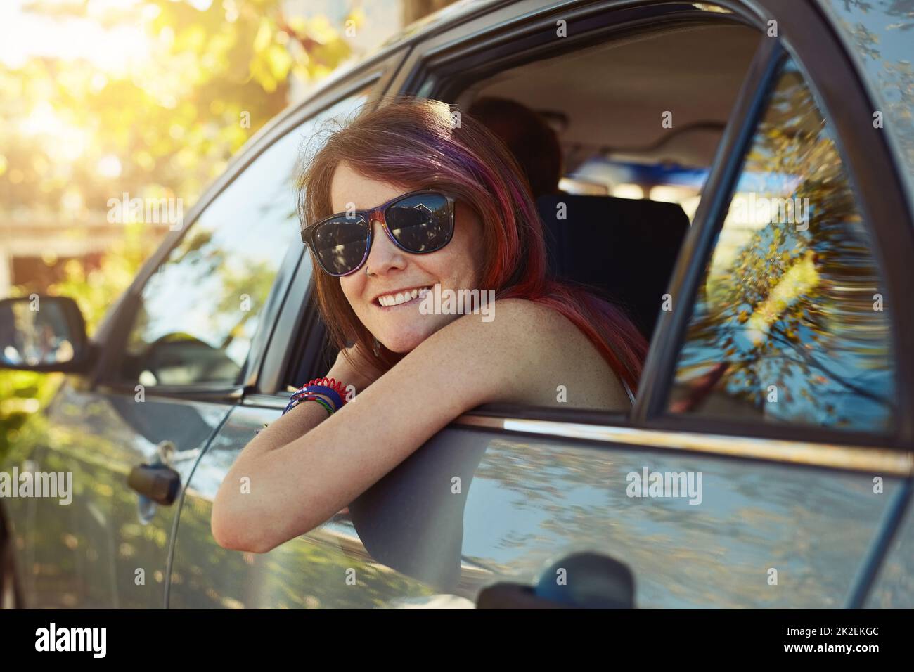 Taking a little break. Shot of a young woman taking a break and looking ...