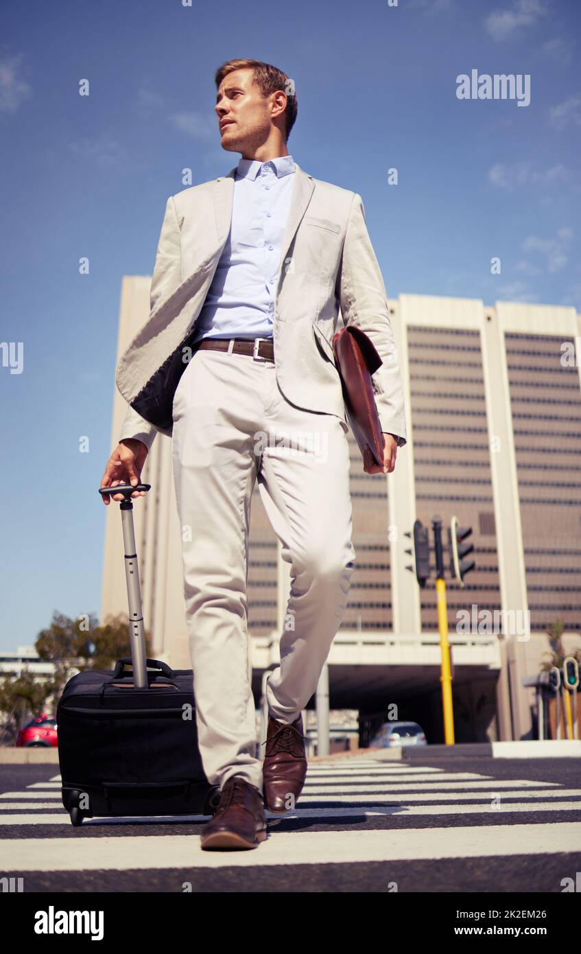 Walking a suitcase hi-res stock photography and images - Alamy