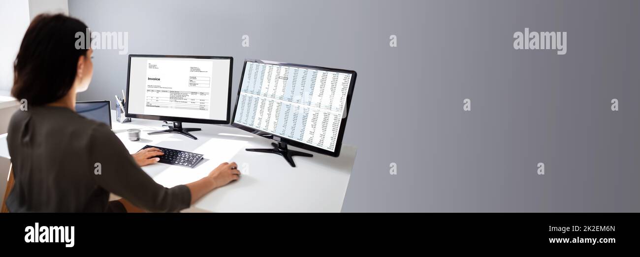 Businessperson calculating invoice computer hi-res stock photography ...