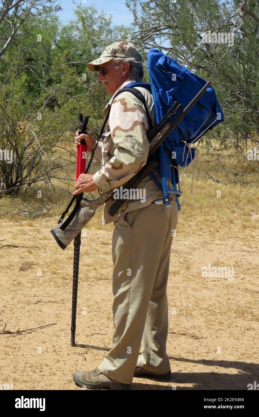 Senior Hunter in Desert Stock Photo - Alamy