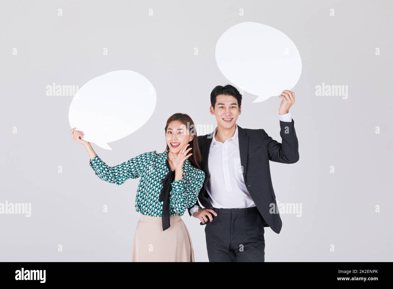Korean young couple, man and woman wearing modern Hanbok holidng speech bubble panel Stock Photo ...