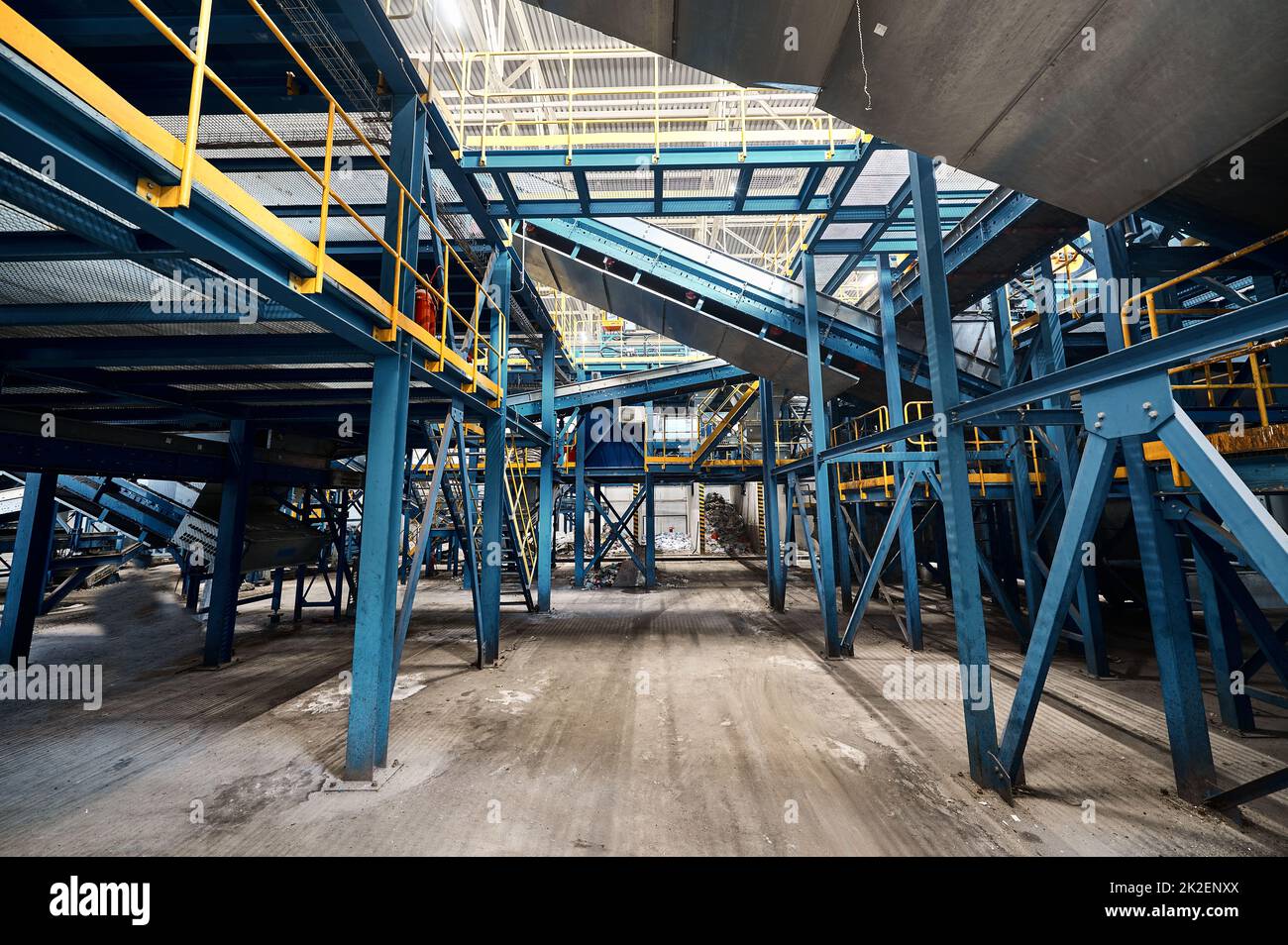 Large production line with conveyors carrying trash at plant Stock ...