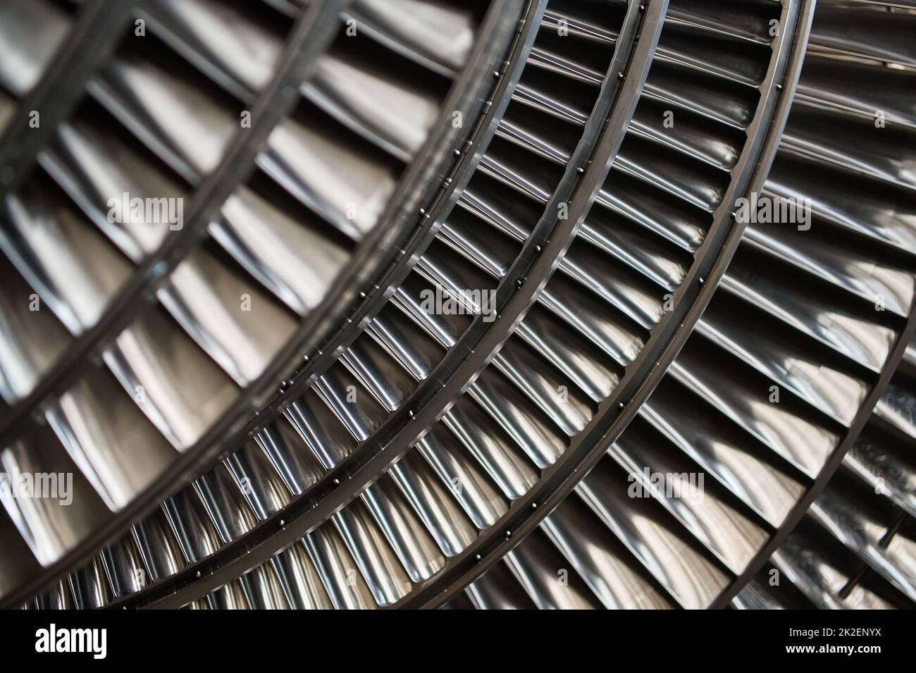 Metal blades of high-speed steam turbine in light workshop Stock Photo ...