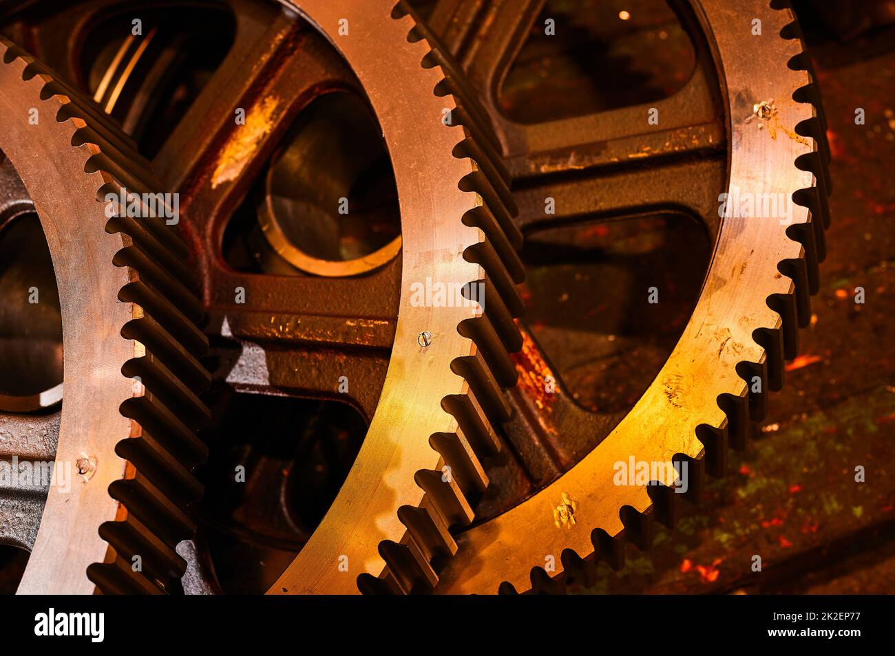 Set of huge cogwheels for spiral gear drive in warehouse Stock Photo ...