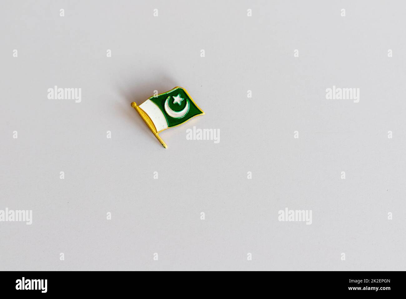 Pakistan flag with a beautiful mountains and river landscape background ...