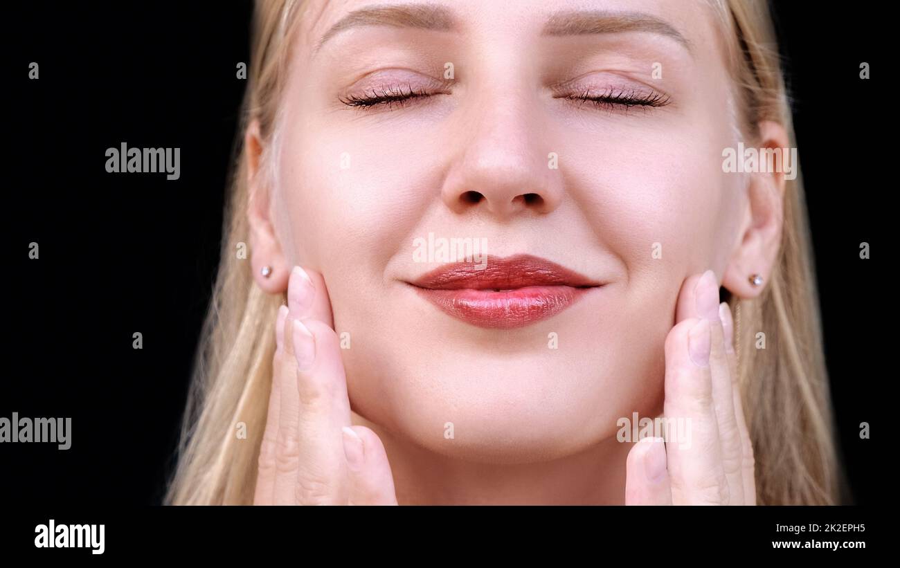 Natural beauty and self-care. Young attractive blonde smiling woman ...