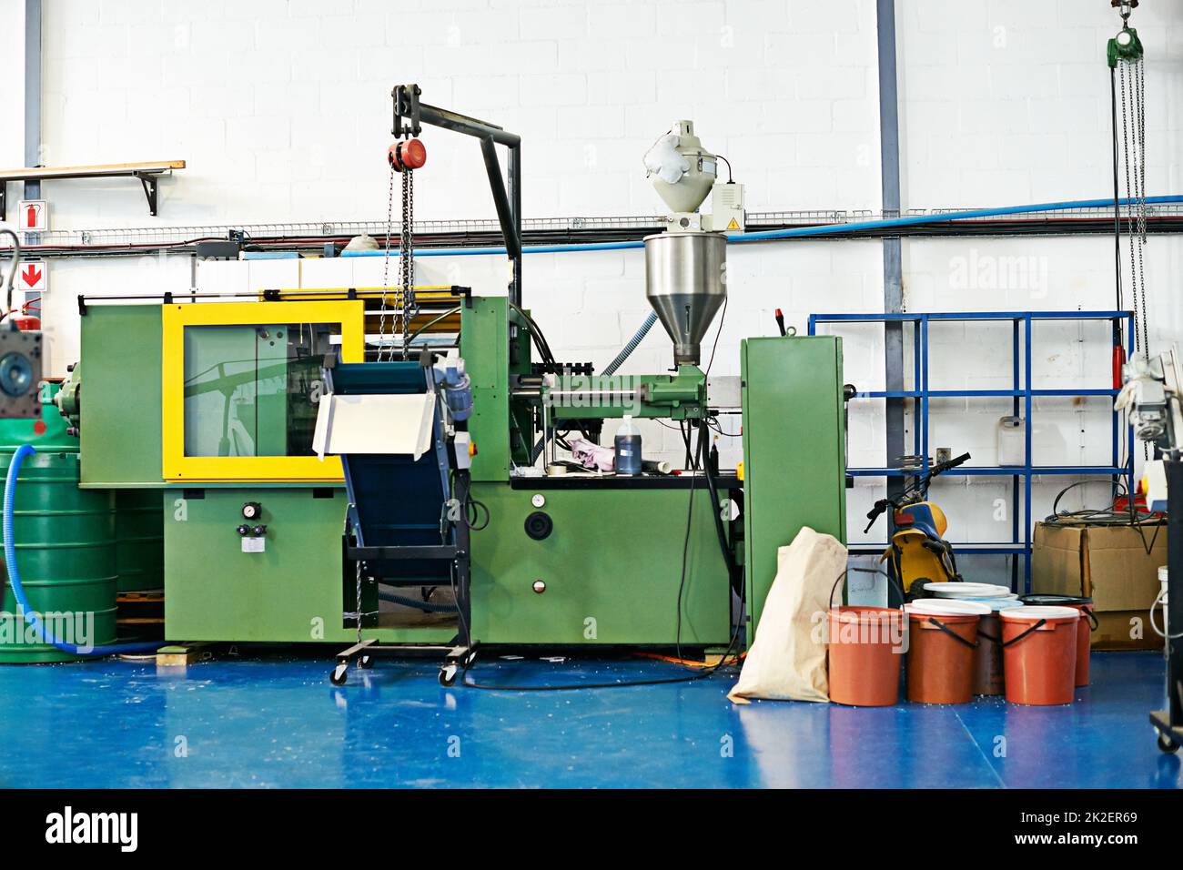 On the factory floor. Shot of warehouse machinery Stock Photo - Alamy