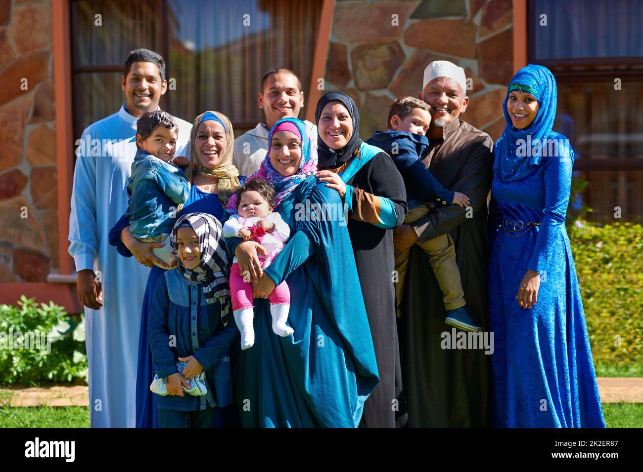 Muslim couple in front house hi-res stock photography and images - Alamy