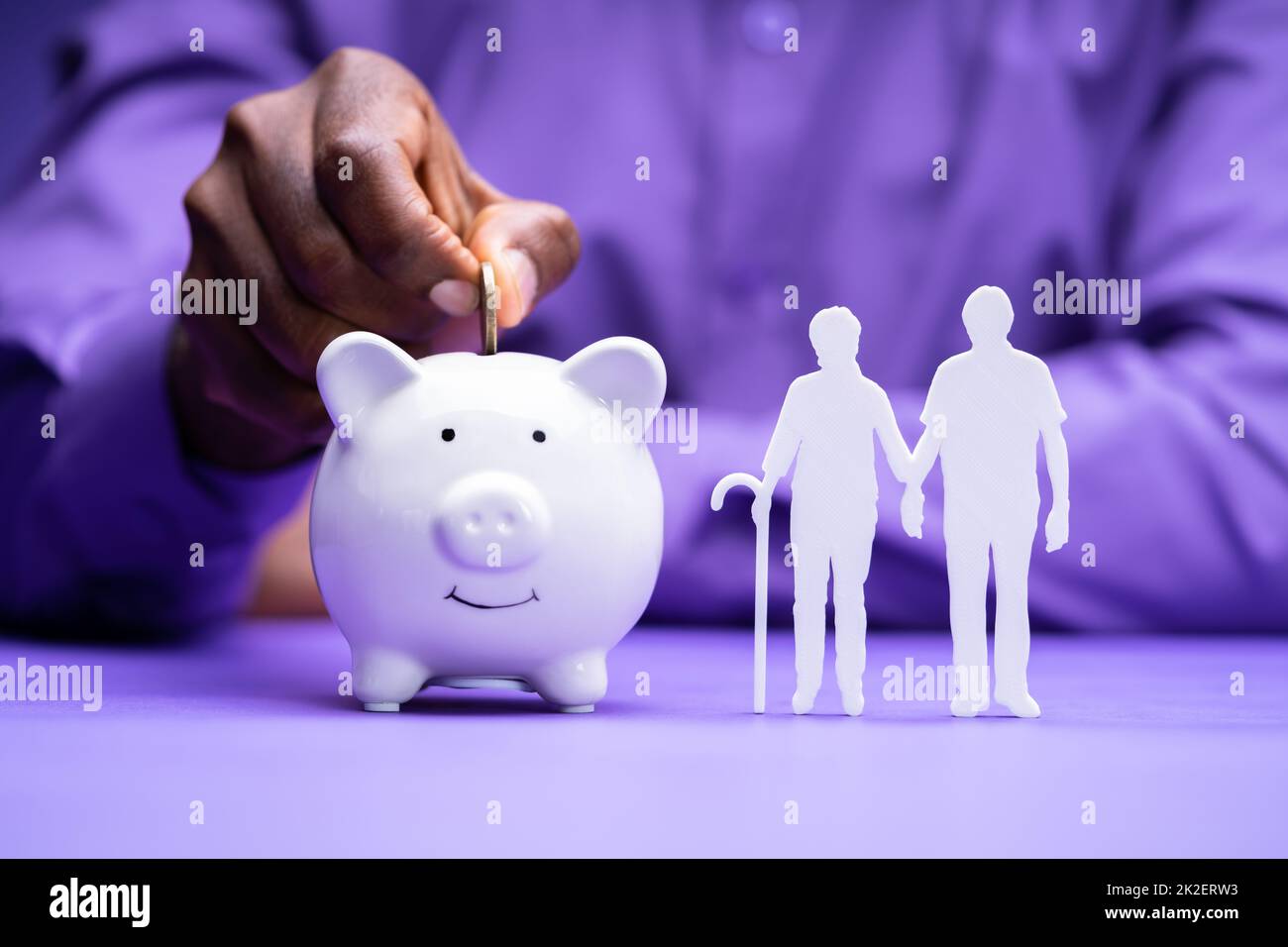 African American Saving In Piggy Bank Stock Photo - Alamy