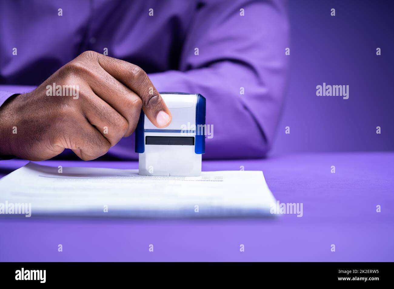African American Black Man Using Notary Stamp Stock Photo - Alamy