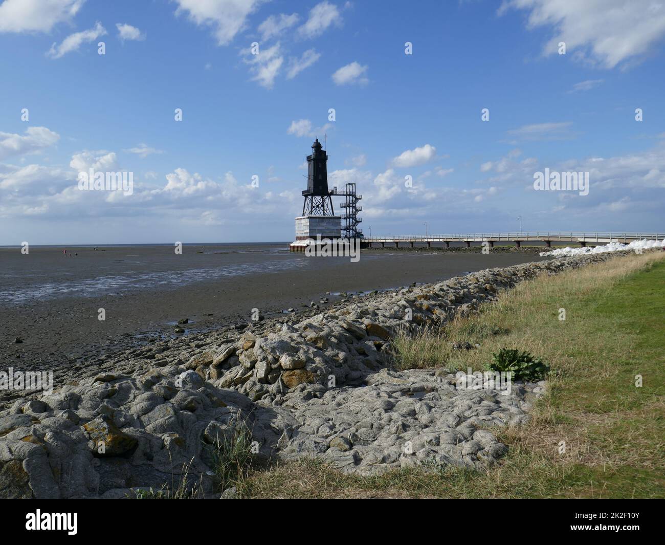 Lighthouse in the mud flats, Dorum Neufeld Stock Photo - Alamy