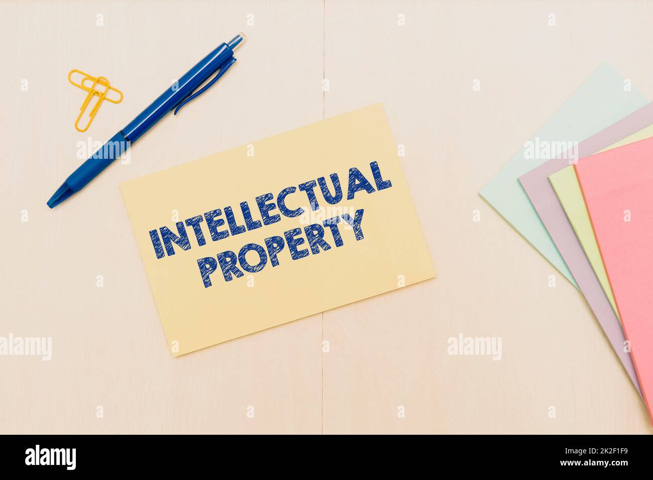 Hand writing sign Intellectual Property. Internet Concept Protect from ...