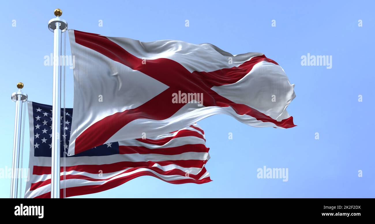 The flags of the Alabama state and United States of America waving in ...