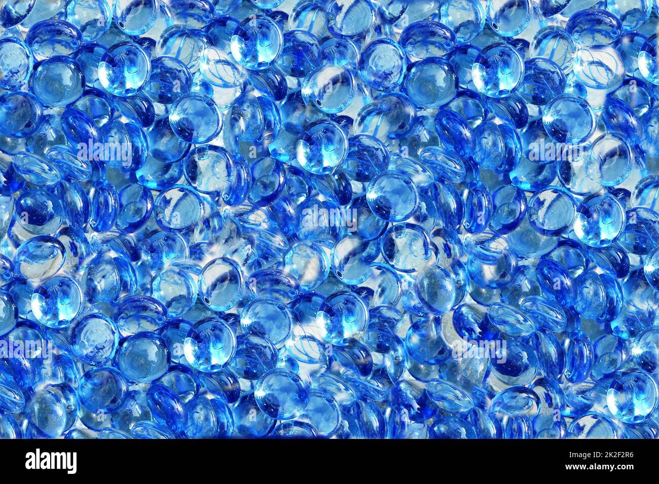 Blue background from glass marbles Stock Photo - Alamy