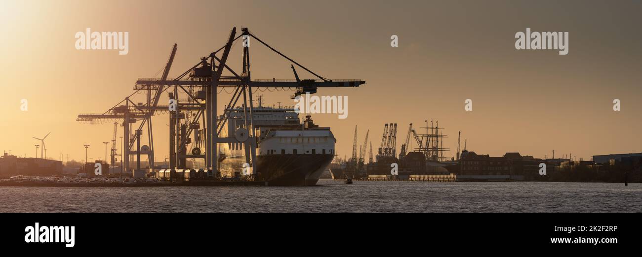 Cargo ship port sunrise hi-res stock photography and images - Alamy
