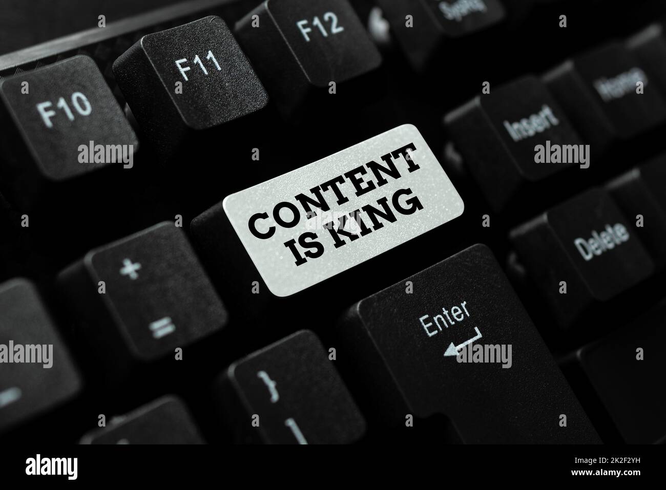 Writing displaying text Content Is King. Word for online advertising ...