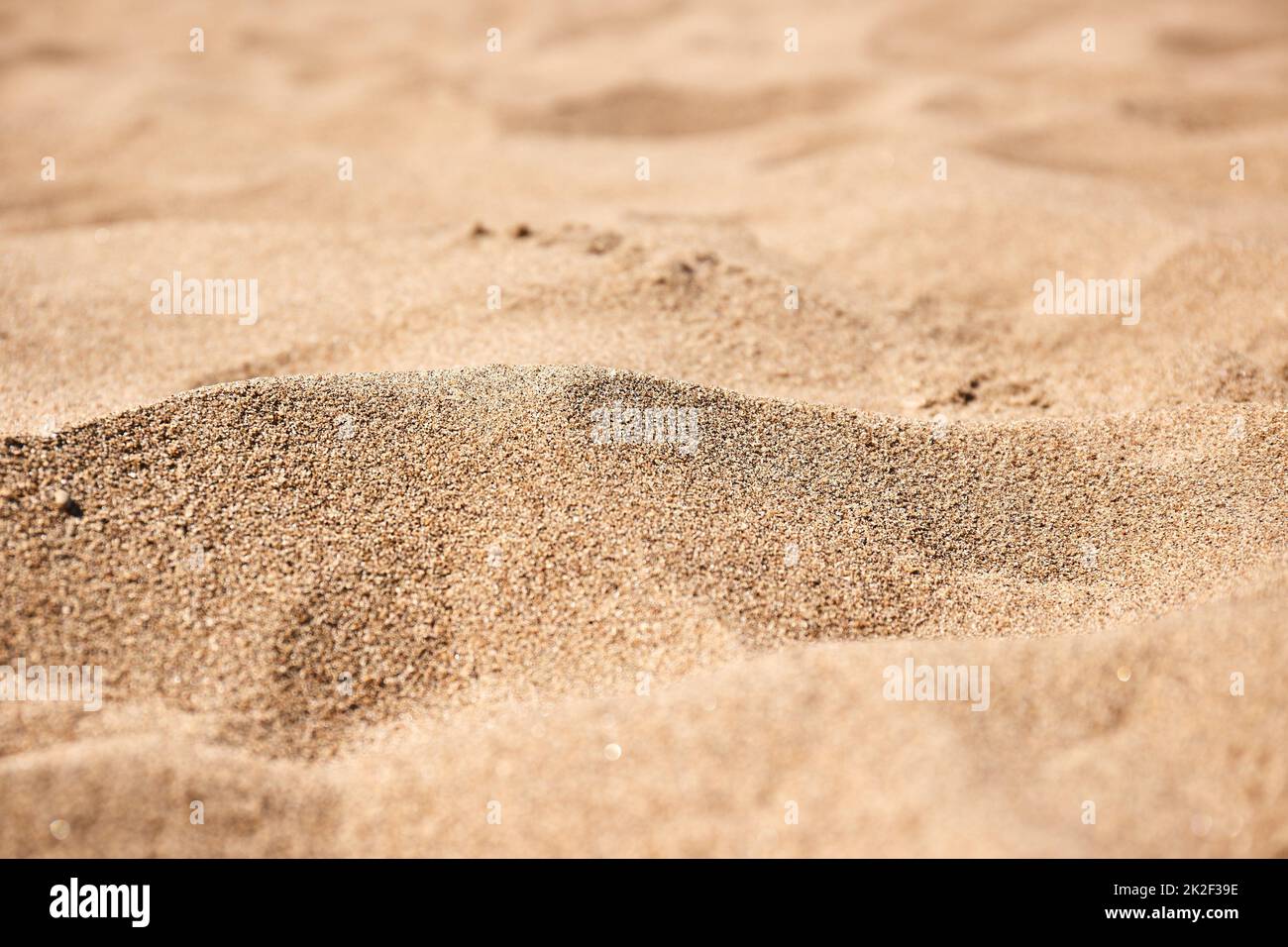 Sand of a beach Stock Photo - Alamy