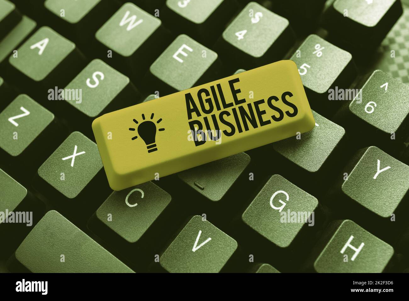 Hand writing sign Agile Business. Business approach capability of ...